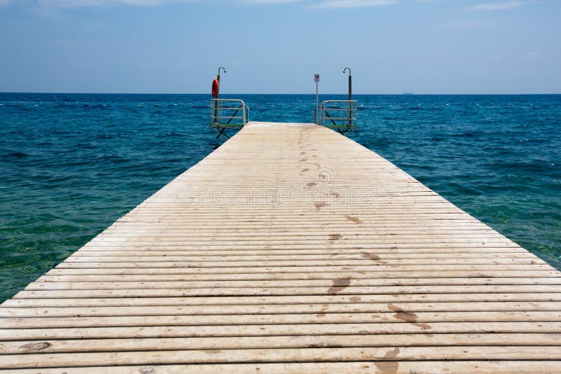 Wooden pier stock image. Image of seascape, blue, coastline - 27682743