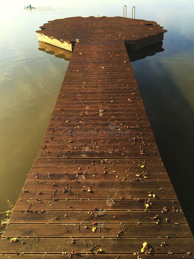 Wooden pier stock photo. Image of water, sunset, pond - 45821452