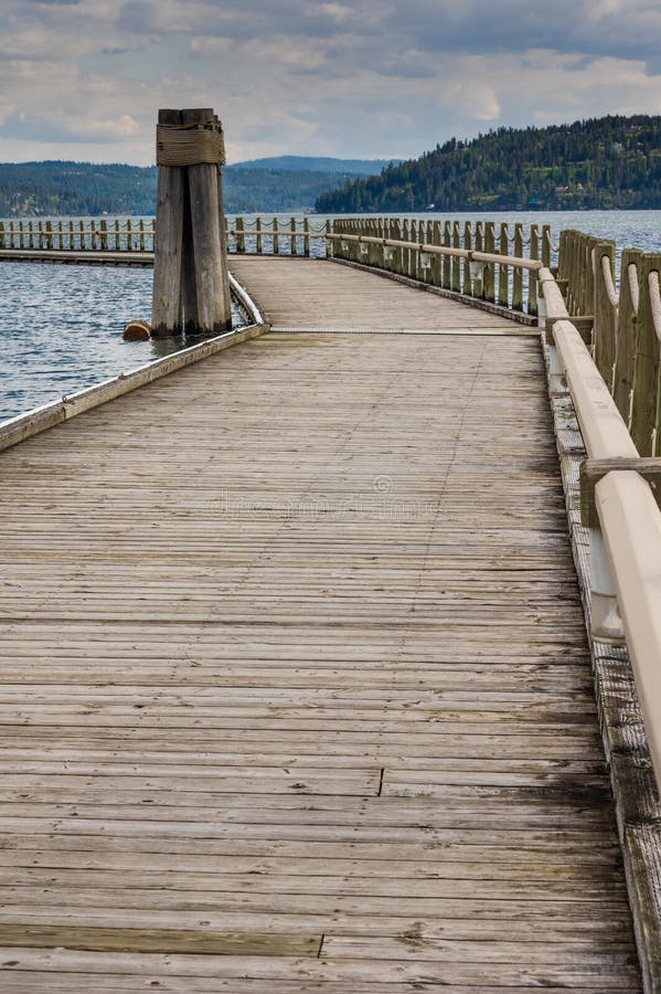 Wooden Pier or Dock Extending into a Lake Stock Image - Image of ...