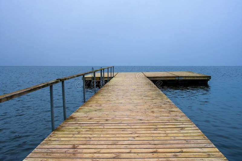 Wooden Pier Going into the Water Stock Photo - Image of perspective ...