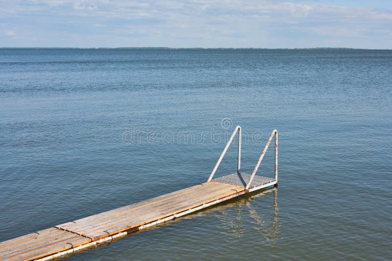 Small wooden pier at lake stock photo. Image of boating - 185731260