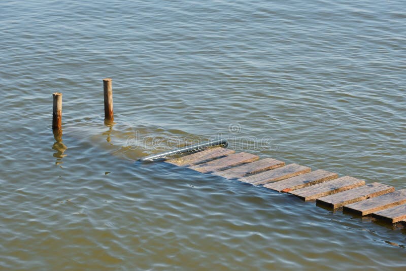 Wooden pier at lake stock photo. Image of harmony, coast - 184168432