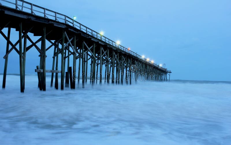 Wooden pier at night stock image. Image of pier, boardwalk - 21541207