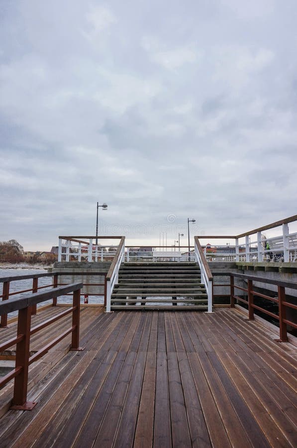Wooden pier stock photo. Image of wood, clouded, platform - 65784156