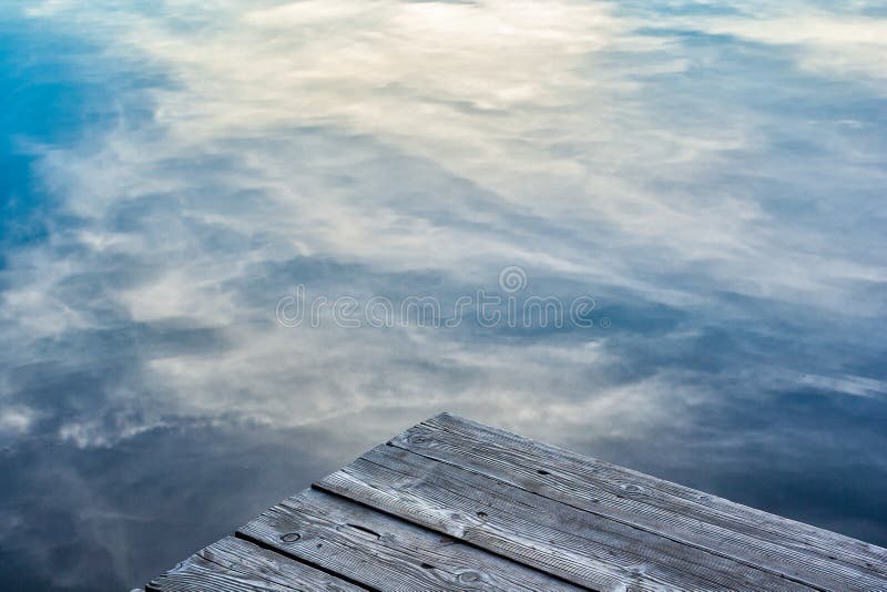 Wooden Pier in the Reflections of the Sky Stock Image - Image of ...