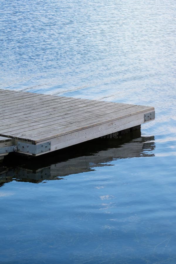Wooden Pier on the Background of Water. Stock Photo - Image of sand ...