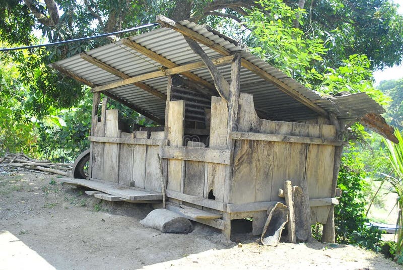 Wooden Pig Pen with Green Trees in the Background Stock Photo - Image ...