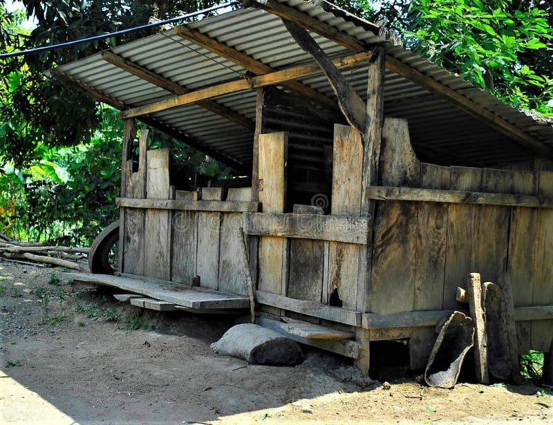 Wooden Pig Pen with Green Trees in the Background Stock Image - Image ...