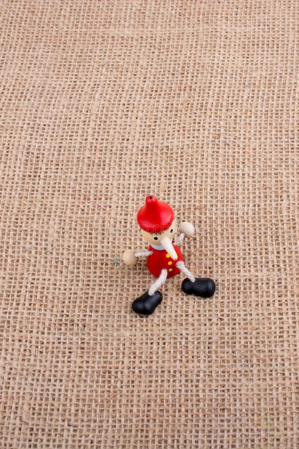 164 Pinocchio Sitting Stock Photos - Free & Royalty-Free Stock Photos ...
