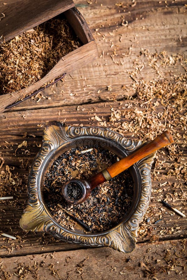 Wooden Pipe with Tobacco in an Ashtray Stock Photo - Image of narcotic ...