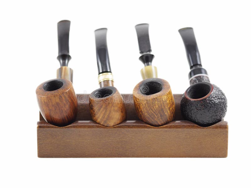 Wooden pipes on an holder stock photo. Image of holder - 57262160