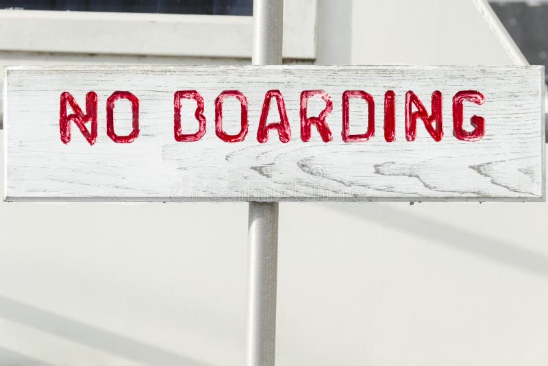 Wooden Plank with the Phrase Prohibition No Boarding Stock Photo ...