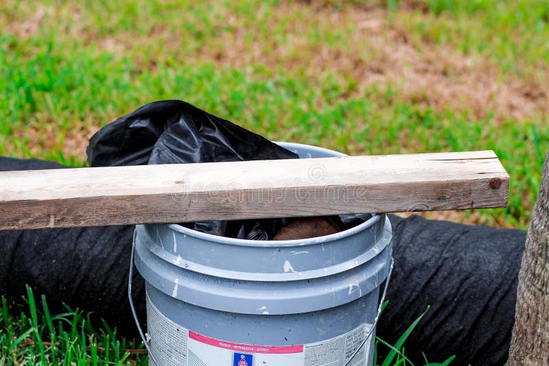 Wooden Plank on Top of a Metal Bucket Stock Image - Image of handle ...