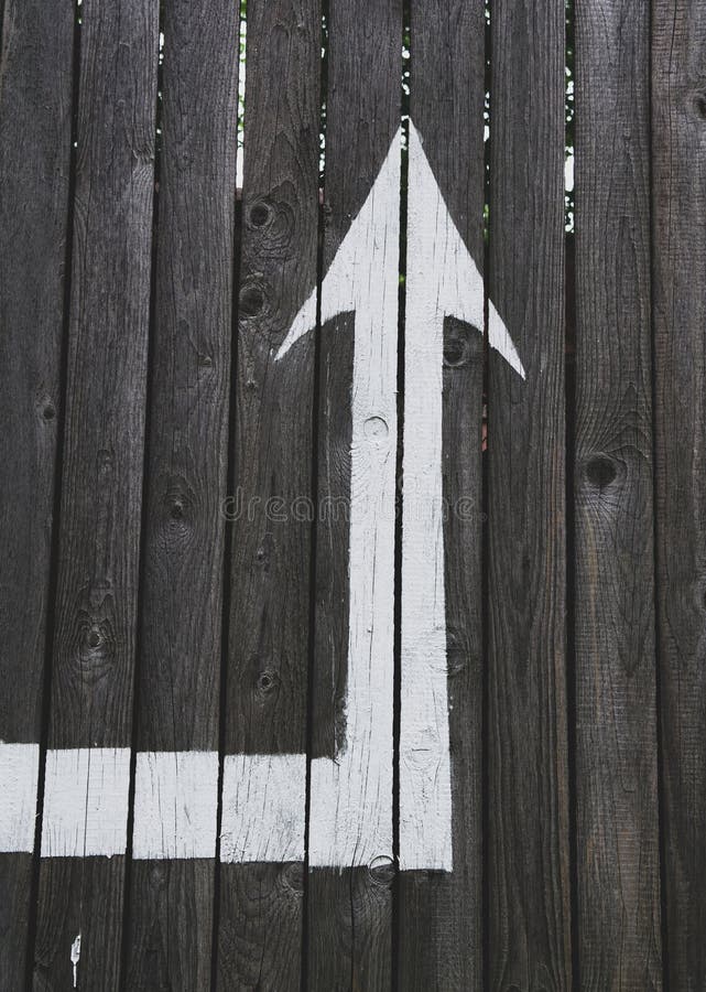 Wooden Planks with Painted Arrow Stock Photo - Image of fence, gritty ...