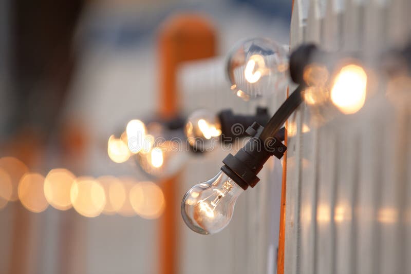 The Chain from Glowing Bulbs Stock Photo - Image of glow, glass: 99045988