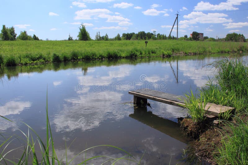 Wooden platform stock image. Image of small, clouds, river - 55851915
