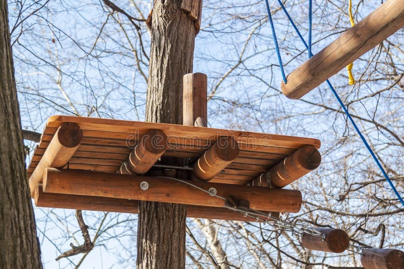 Wooden Platform on Tree in Rope Climb Park in Spring Forest. Wooden ...