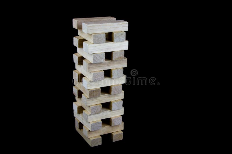 Wooden Play Blocks Stacked Against a Black Background Stock Photo ...