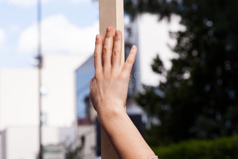 Wooden pole held by hand stock image. Image of business - 35806729
