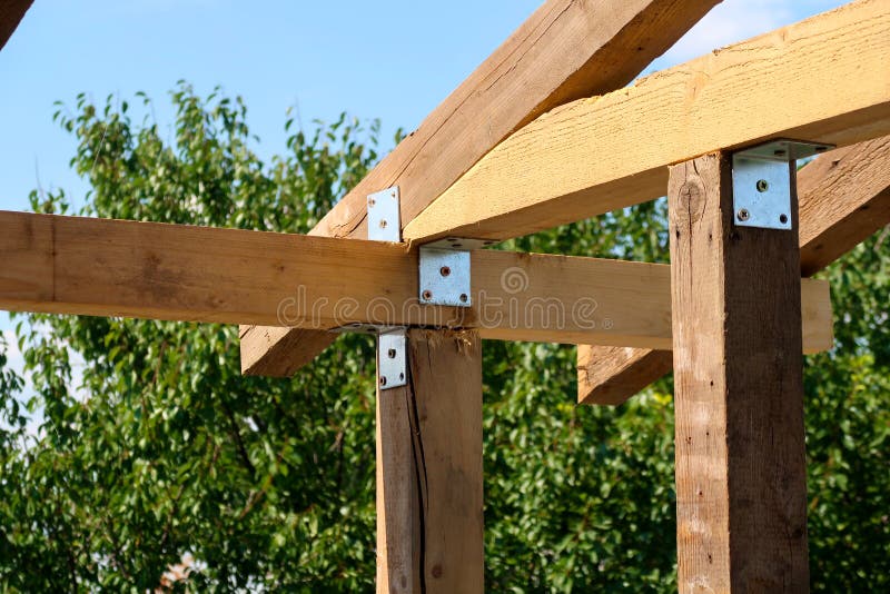 Wooden Poles in a Construction Stock Image - Image of fixes, poles ...