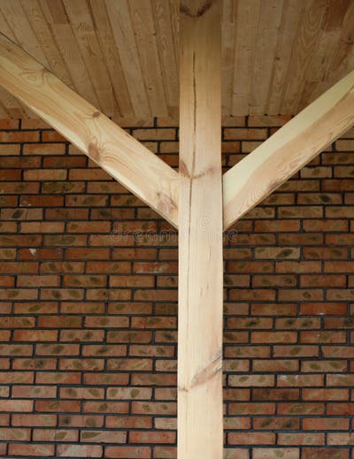 Wooden post with struts stock photo. Image of rafter - 260175116
