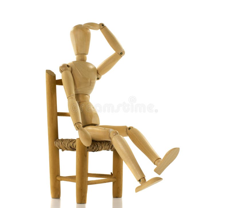 Wooden puppet on chair stock photo. Image of studio, looking - 28770188