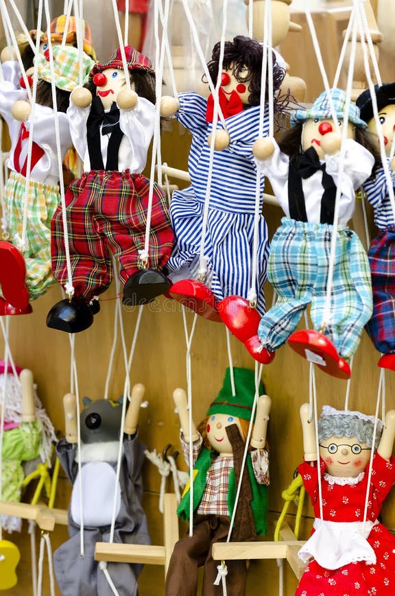 Wooden puppet in a market stock photo. Image of tradition - 64646626