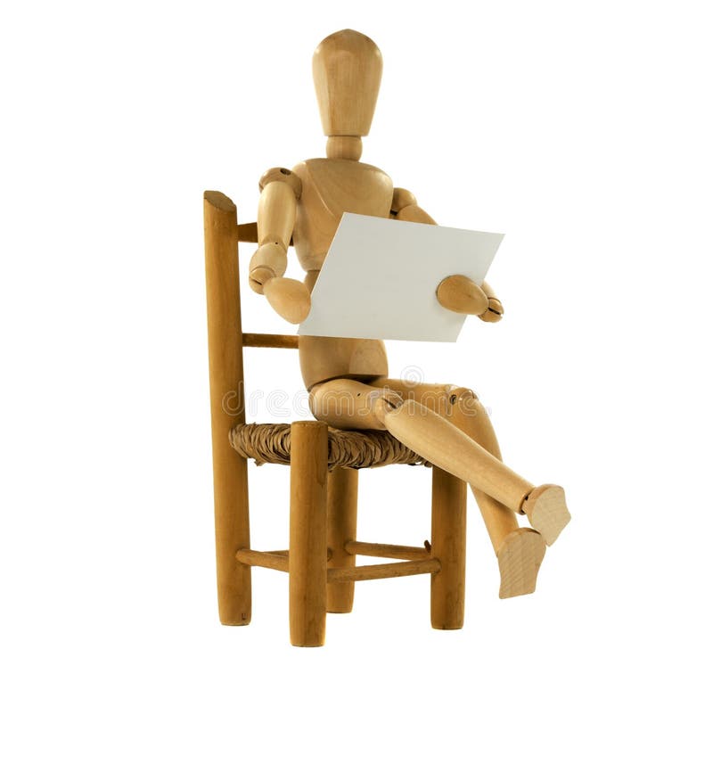Wooden Puppet Reading a Notice Stock Image - Image of blank, sitting ...