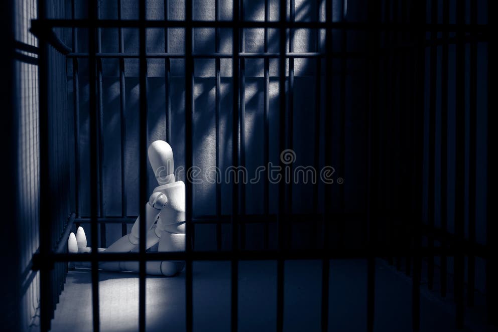 Wooden puppets in prison stock photo. Image of jail, puppet - 59079794
