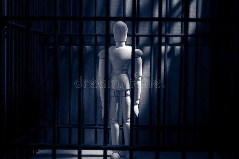 Wooden puppets in prison stock photo. Image of model - 59079914