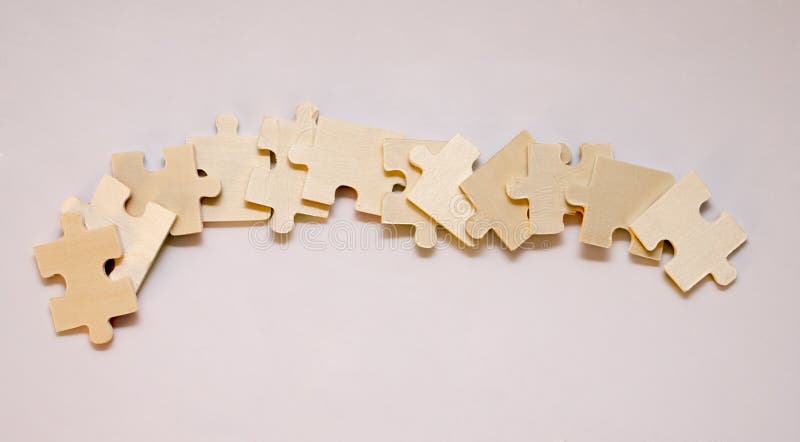 Wooden Puzzle is Laid Out in a Row Stock Image - Image of abstraction ...