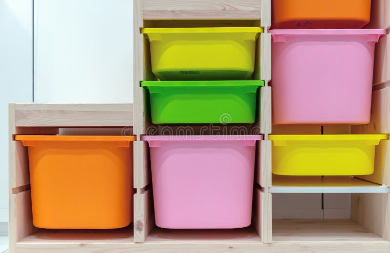 Wooden Rack with Multi-colored Retractable Plastic Boxes Stock Photo ...