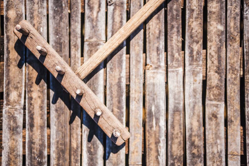 Old wooden rake on grass stock photo. Image of object - 9164878