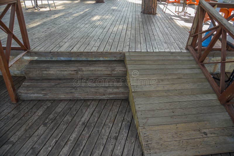 Wooden Ramped Access, Using Wheelchair Ramp for Disabled People Stock ...