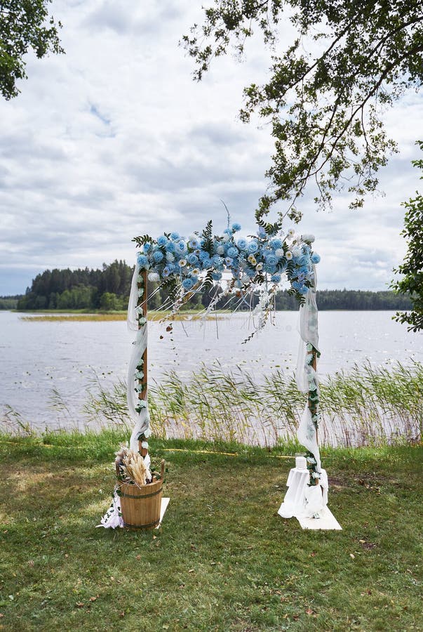 Wooden Rectangular Wedding Arch Decorated with Flowers Stock Photo ...