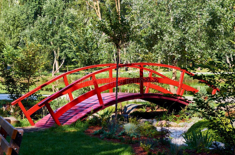 Wooden Red Decorative Bridge Across the Pond Stock Image - Image of ...
