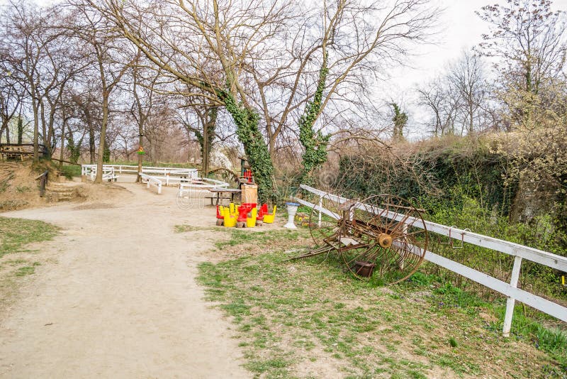 Wooden Benches in the City Park.Sunny Day on the Promenade in the City ...
