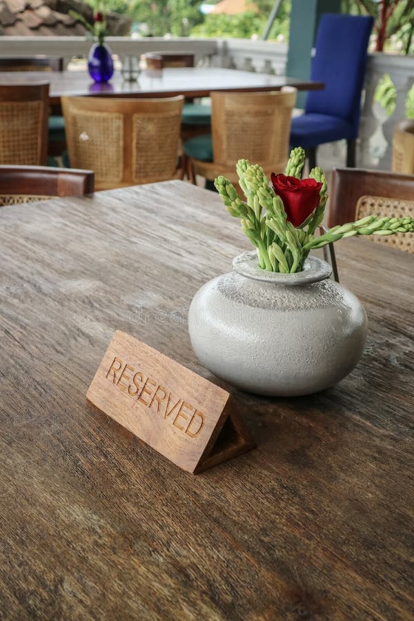 Wooden Reserved Sign on a Table Stock Image - Image of summer ...