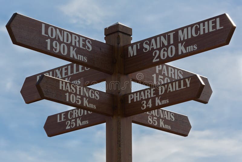 Wooden Road sign stock photo. Image of guide, normandy - 58475046