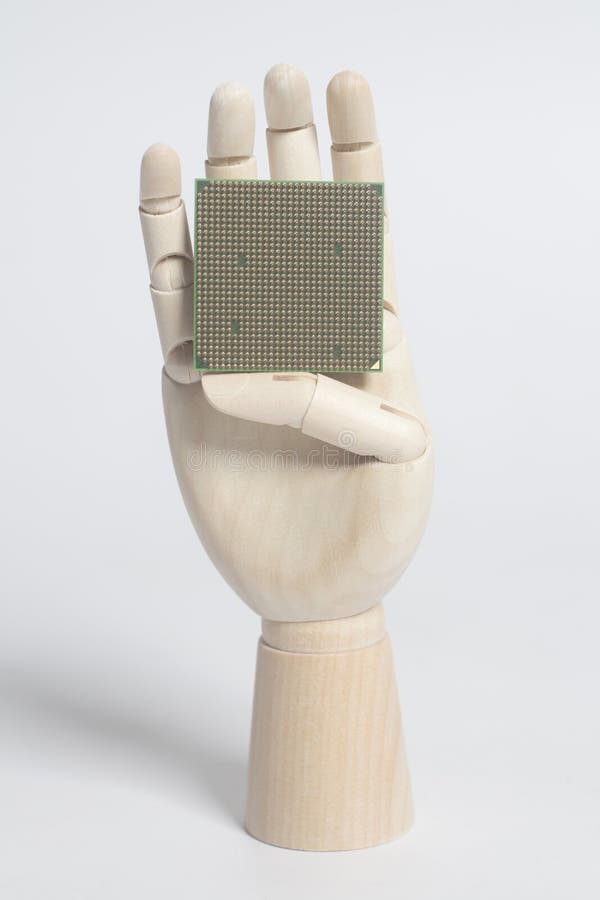 Wooden Robot Hand Holding Central Processing Unit CPU Microchip Stock ...