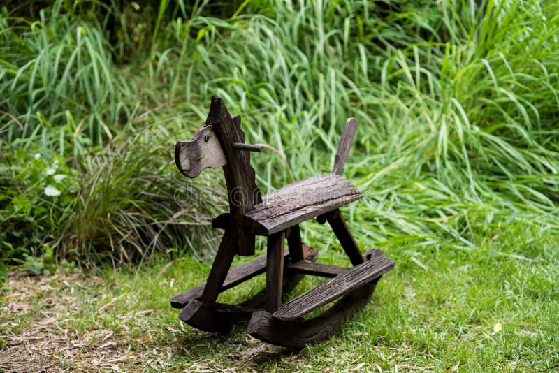 Wooden Rocking Toy on Yard Garden Stock Image - Image of vintage, rock ...
