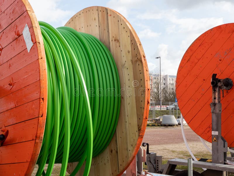 Wooden Roller with Green Fiber Optic Cables for Laying Data Cables at ...