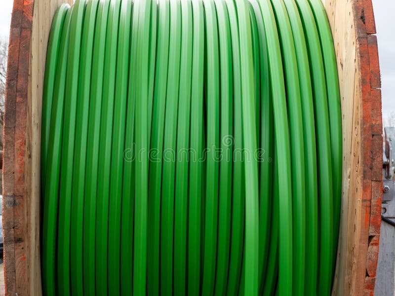 Wooden Roller with Green Fiber Optic Cables for Laying Data Cables at ...
