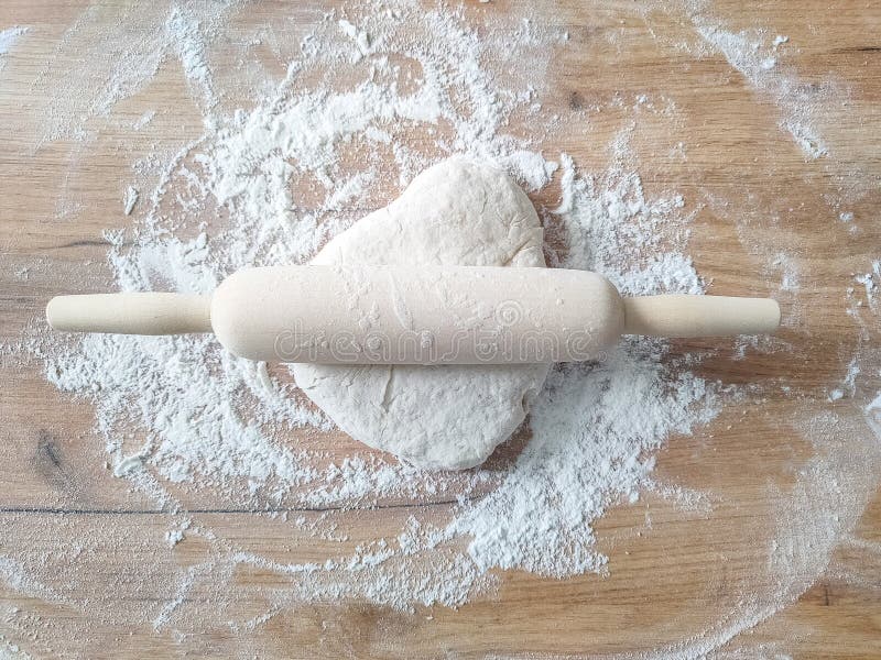 Wooden Rolling Pin and Dough on Wooden Table Stock Photo - Image of ...