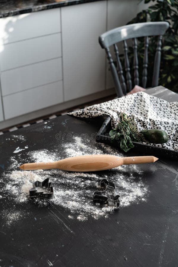 A Wooden Rolling Pin Lies on a Table among Flour Stock Photo - Image of ...