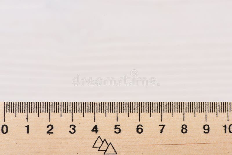 Wooden Ruler Close Up on Yellow Background. Stock Image - Image of ...