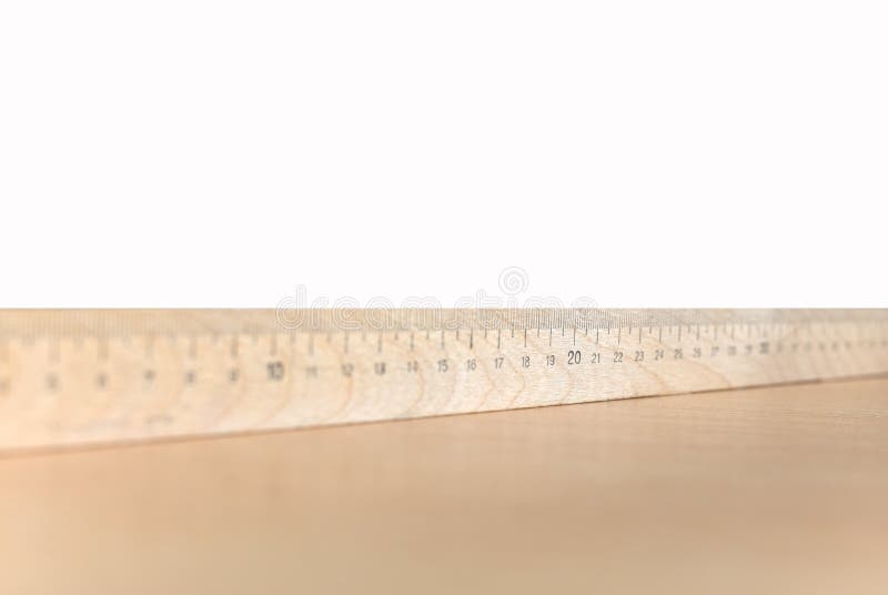 Wooden Ruler on the Table and White Background, Copyspace Stock Photo ...