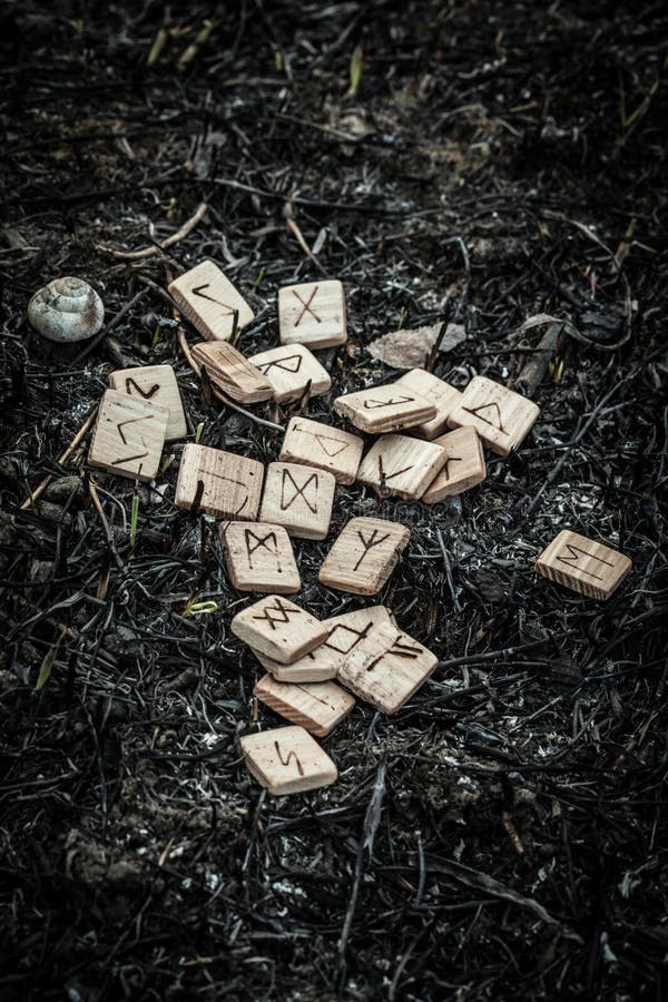 Wooden runes on the ground stock photo. Image of bean - 53102896
