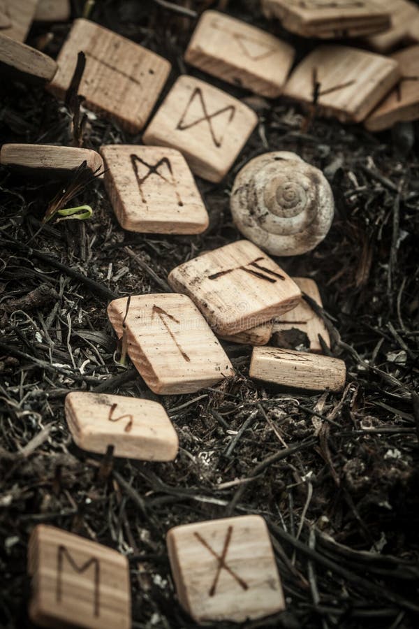 Wooden runes on the ground stock photo. Image of ancient - 53102926