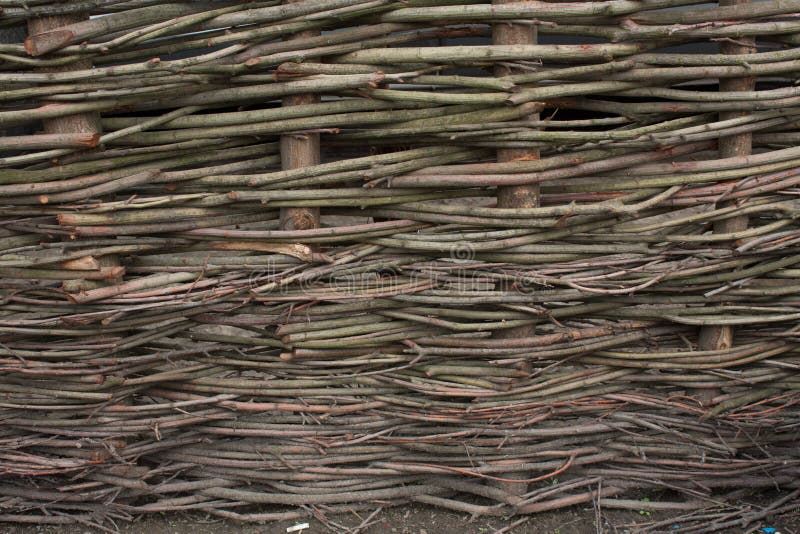Wooden Rustic Fence Made with Chopped Branches Intertwined Togather ...